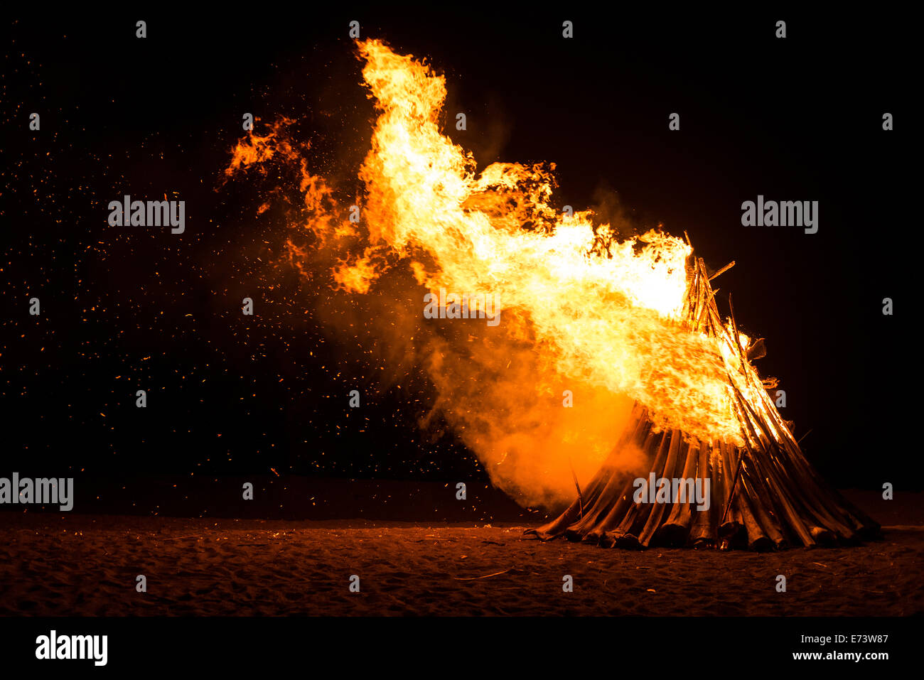 Blazing bonfire on the beach of a small island in the Philippines Stock ...