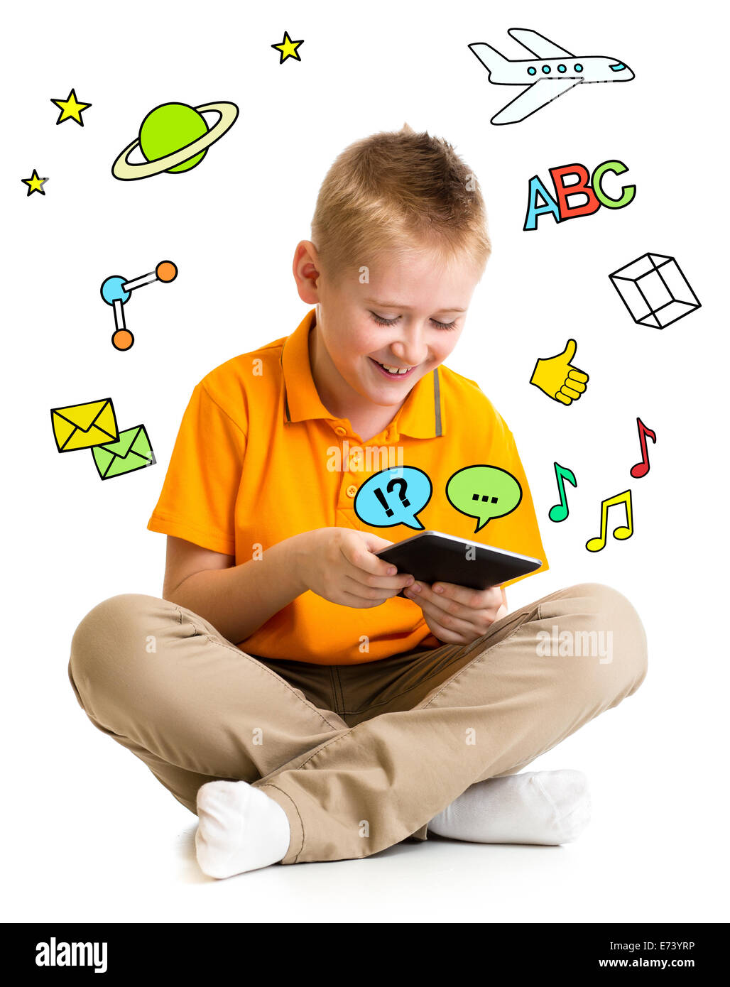 Kid boy sitting with tablet computer and learning or playing with great ...
