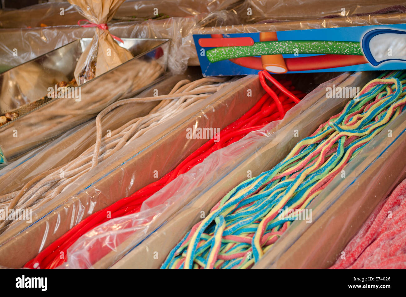 long sweet gum sweetmeats candy in cardboard boxes on market stall ...