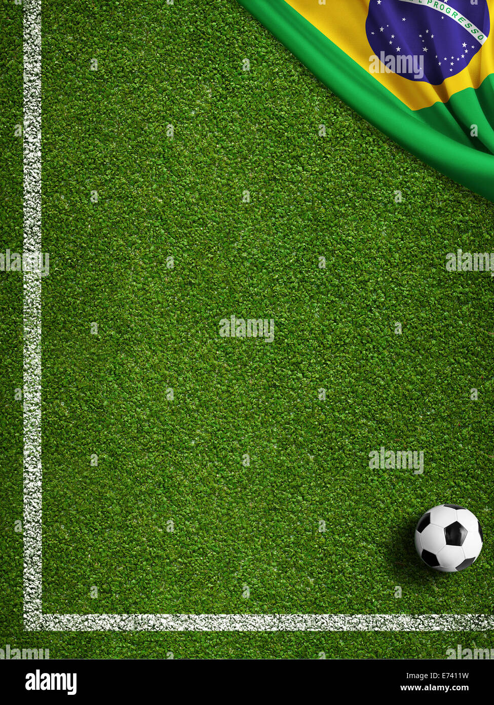 Soccer field with ball and flag of Brazil Stock Photo - Alamy