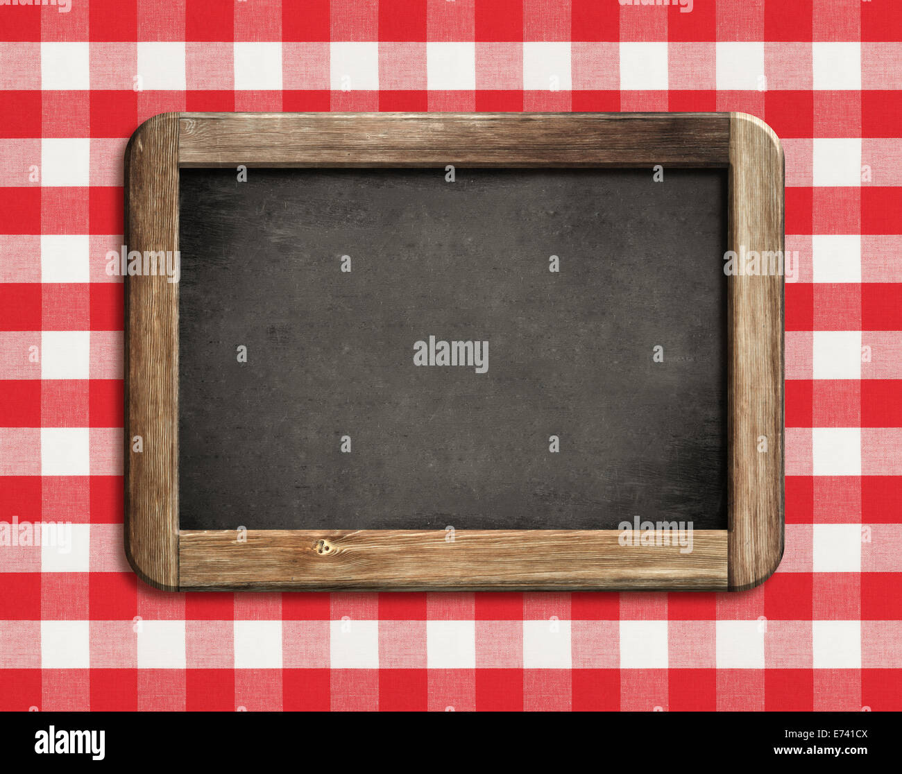 chalkboard or blackboard on picnic tablecloth Stock Photo - Alamy
