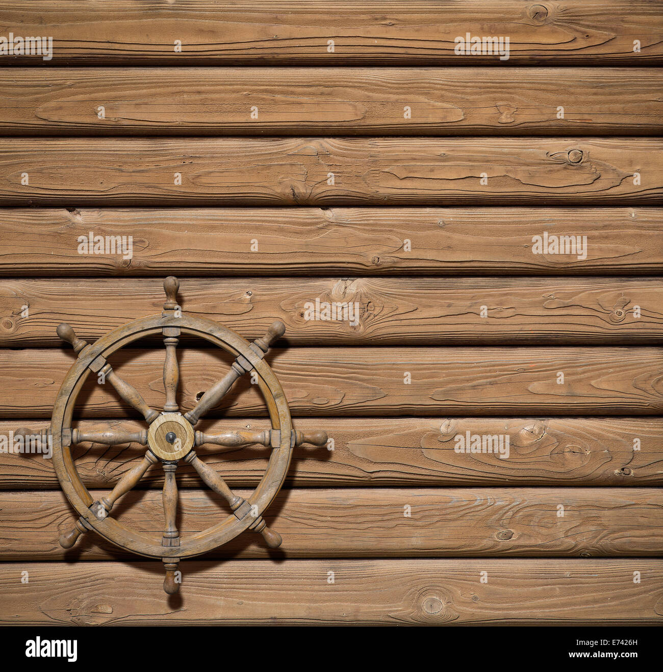 Steering wheel over wood background Stock Photo - Alamy
