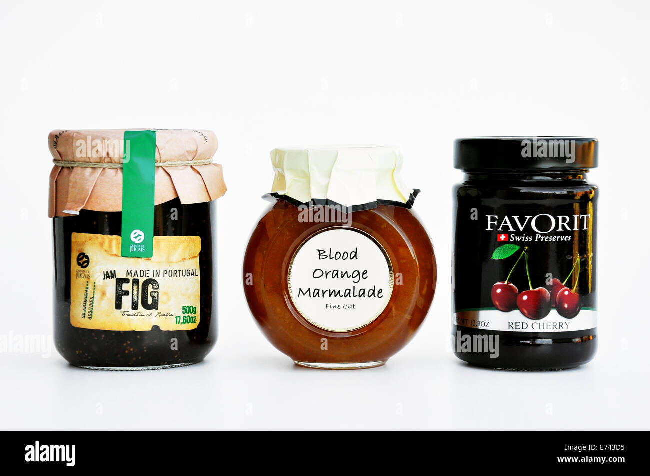 Gourmet jams: fig, blood orange, and cherry Stock Photo - Alamy