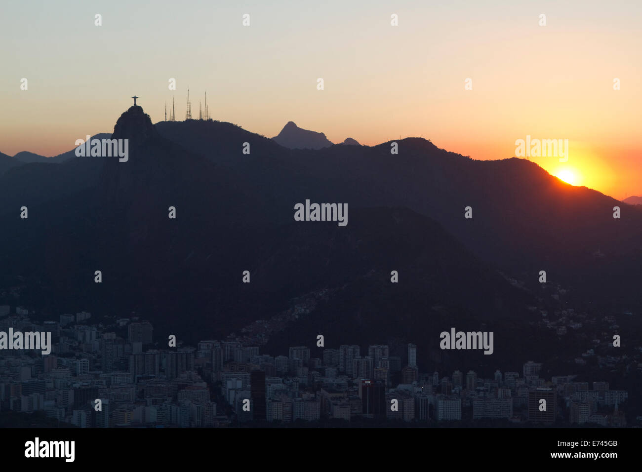 View of parts of Rio de Janeiro in between the mountains at sunset from ...
