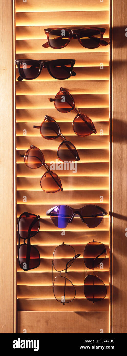 Selection sunglasses on wooden window hi-res stock photography and ...