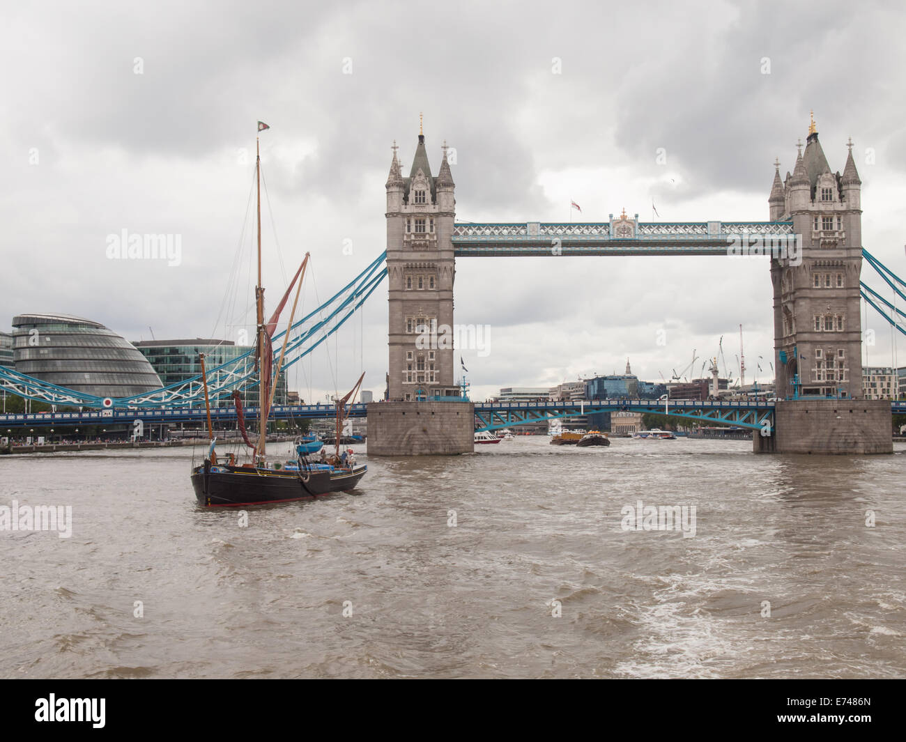 traditional thames barge the galdys on the river thames with, tower ...