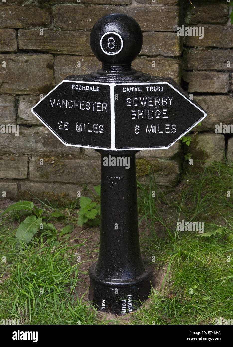 Signpost at side of Rochdale Canal, Hebden Bridge Stock Photo - Alamy