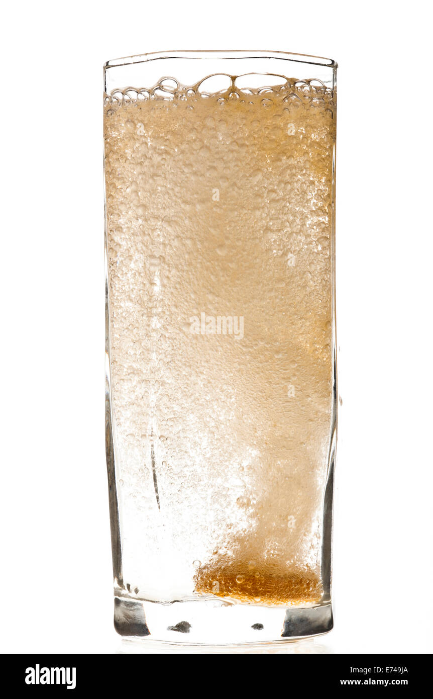 Glass with resoluble vitamins on a white background Stock Photo - Alamy