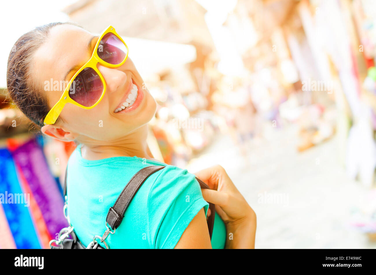 Attractive girl tourist, smiling walking outdoors Stock Photo - Alamy