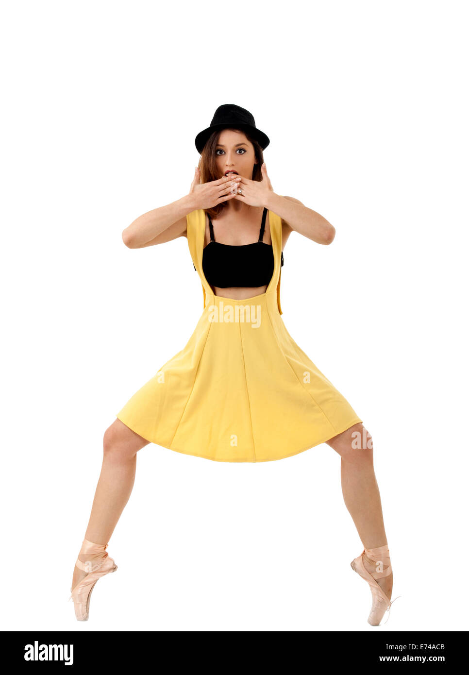 Beautiful young dancer dancing on a white background Stock Photo - Alamy