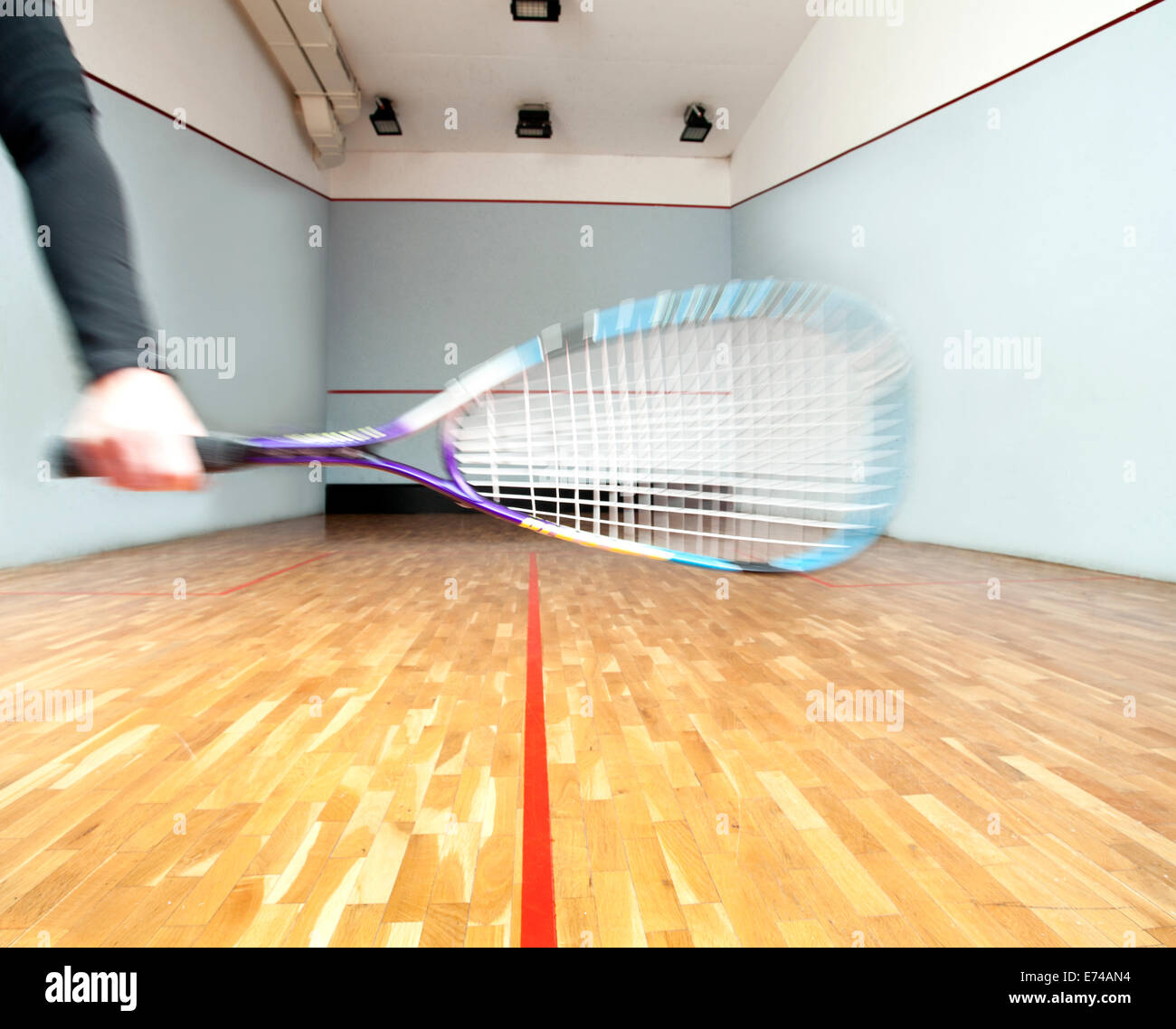 Woman playing squash Stock Photo - Alamy