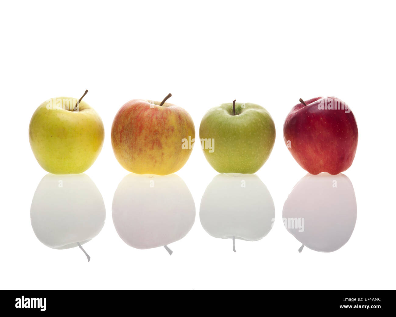 Four different sorts of apples staying together Stock Photo - Alamy