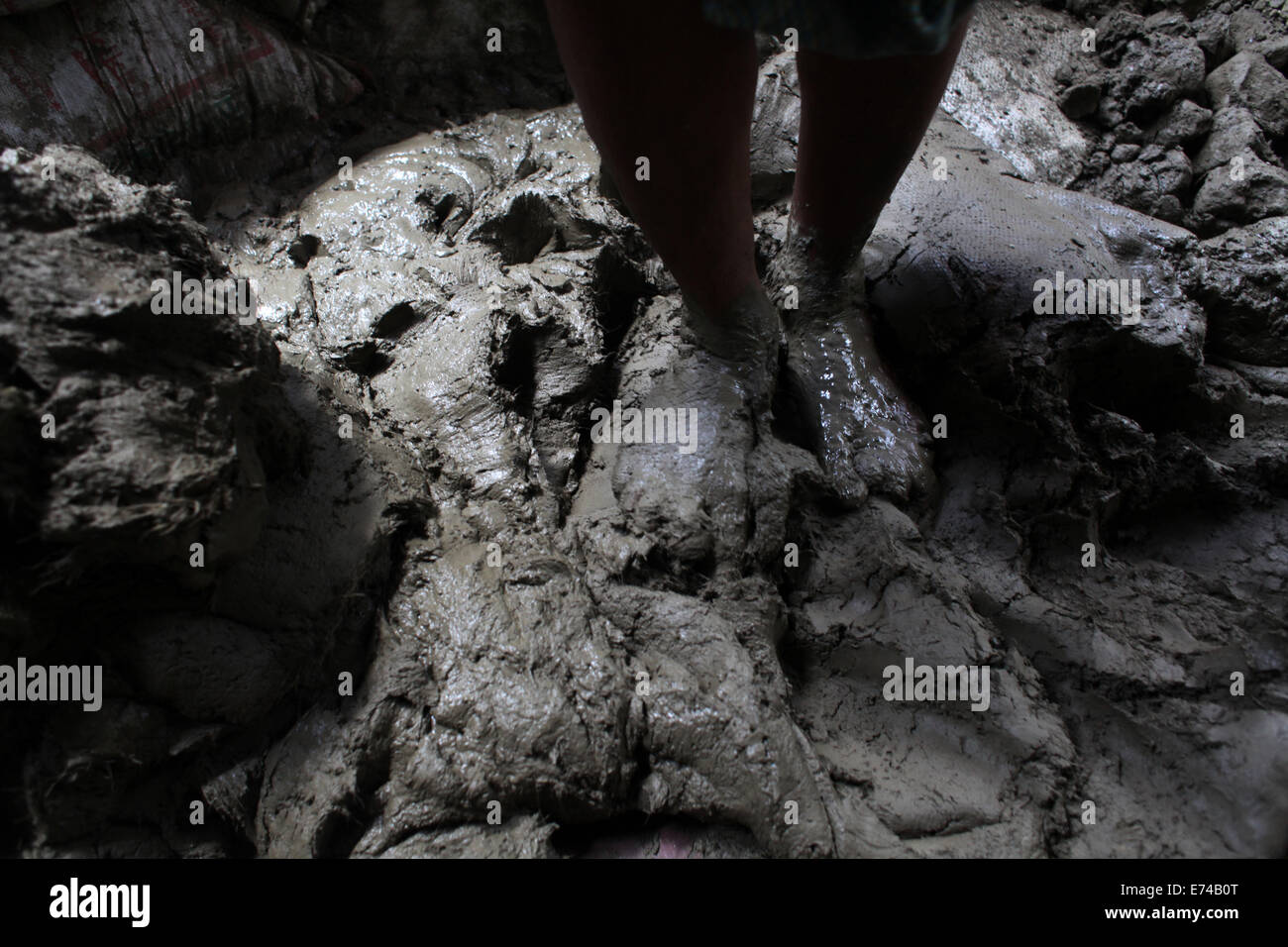 Dhaka, Bangladesh. 6th Sep, 2014. Bangladeshi artist works on a clay ...
