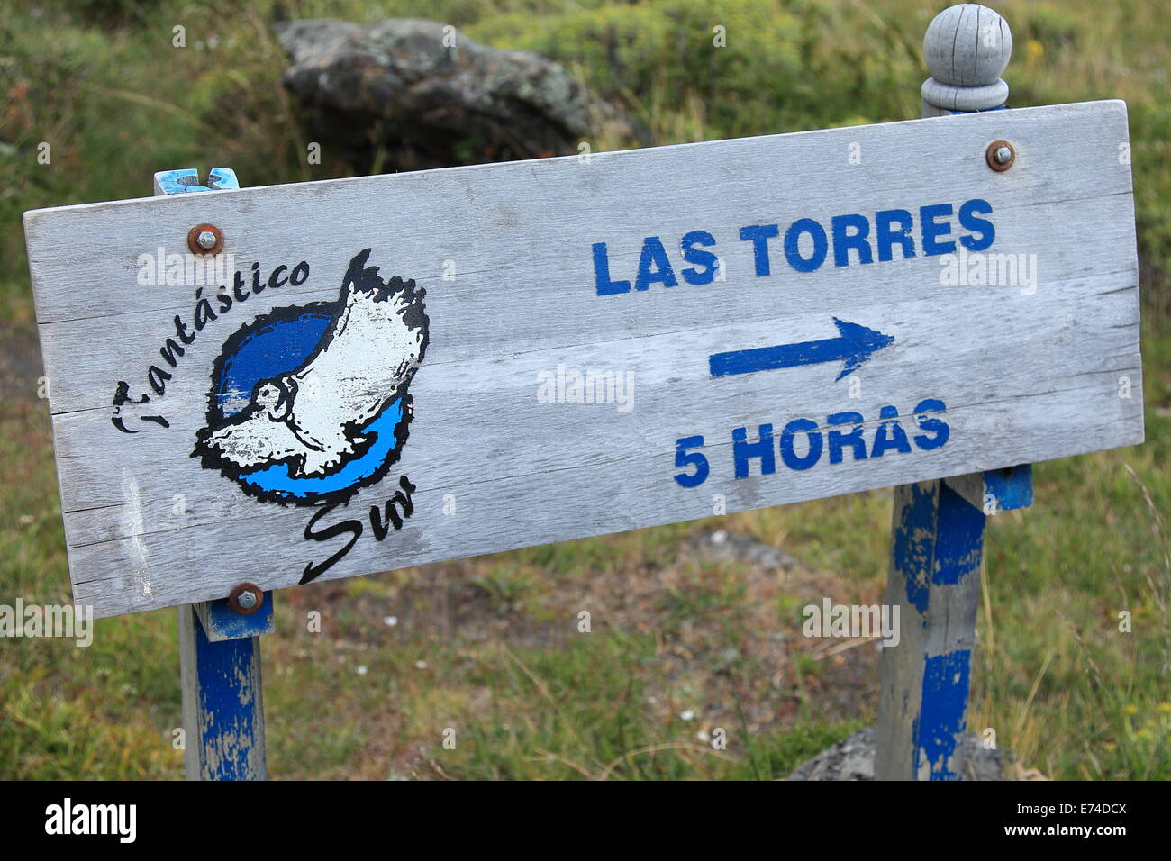 Wooden direction sign guiding hikers in Torres del Paine National Park ...