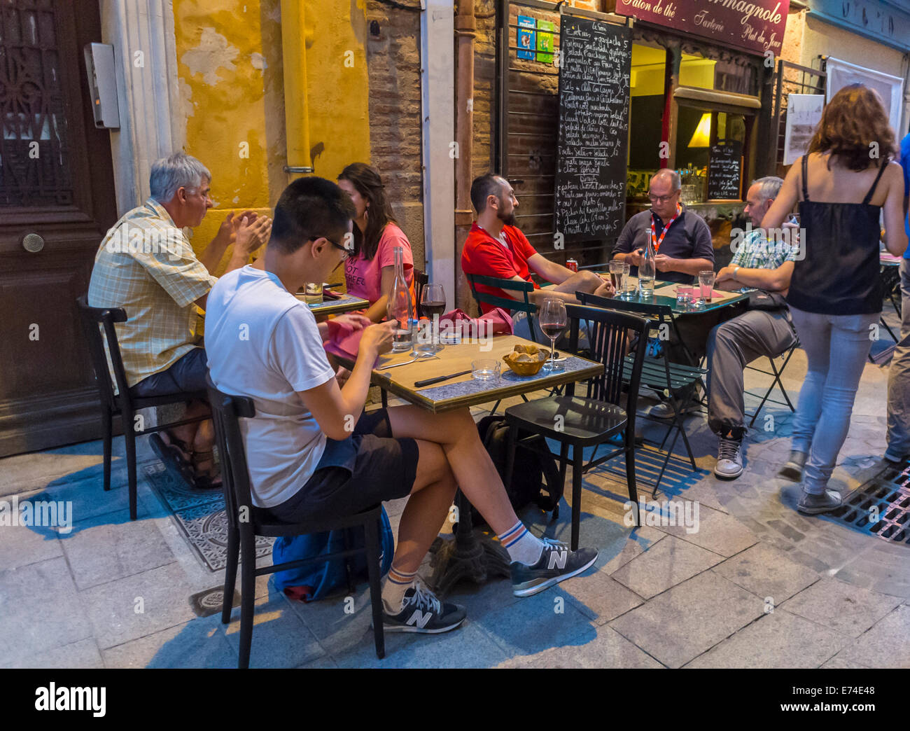 Perpignan France Medium Crowd People Tourists Men Sitting At Table