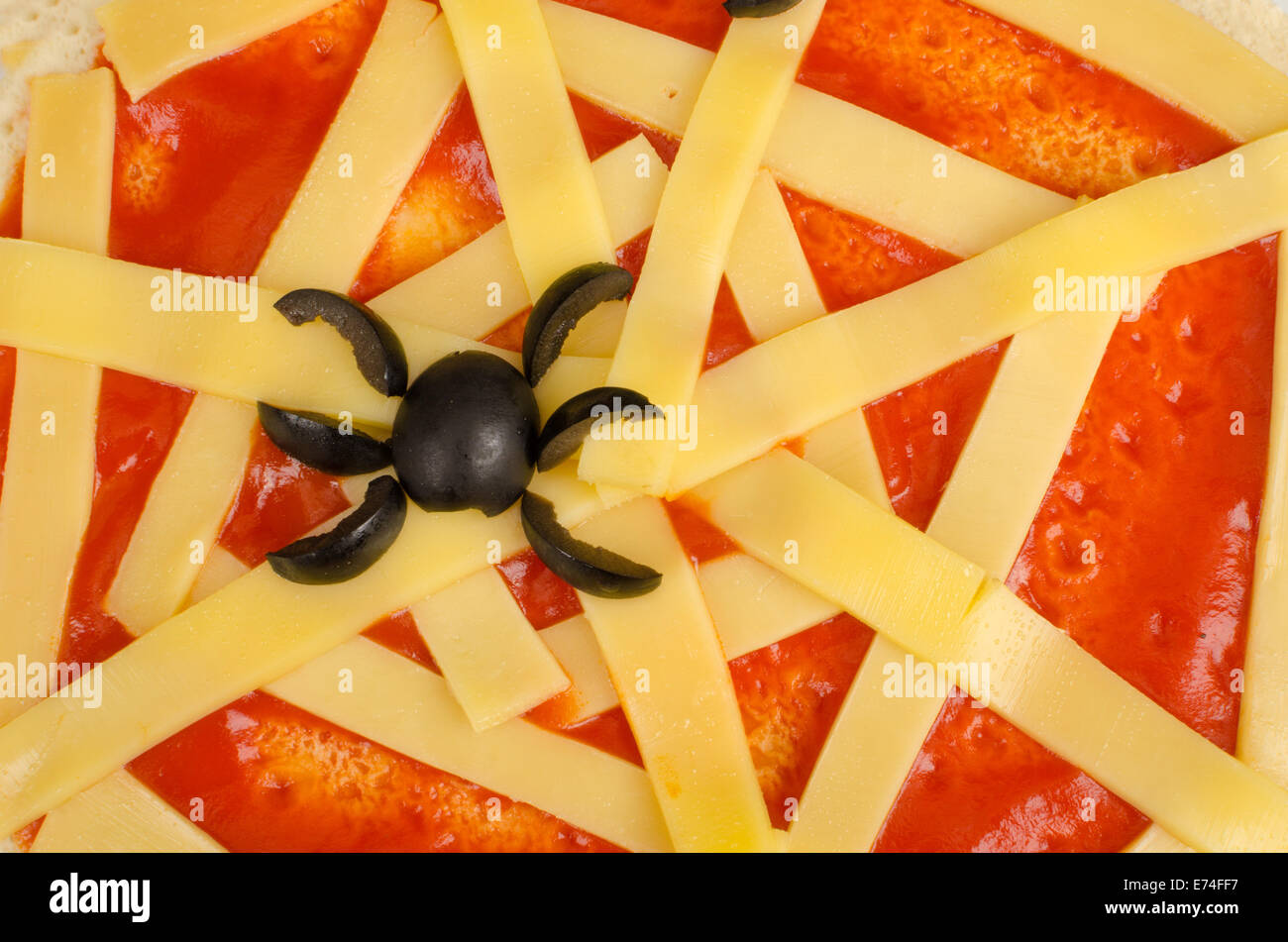 Closeup take of a tomato and cheese cobweb, a Halloween pizza Stock ...