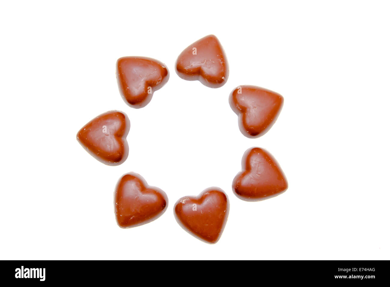 Chocolate hearts in a circle on white background Stock Photo - Alamy