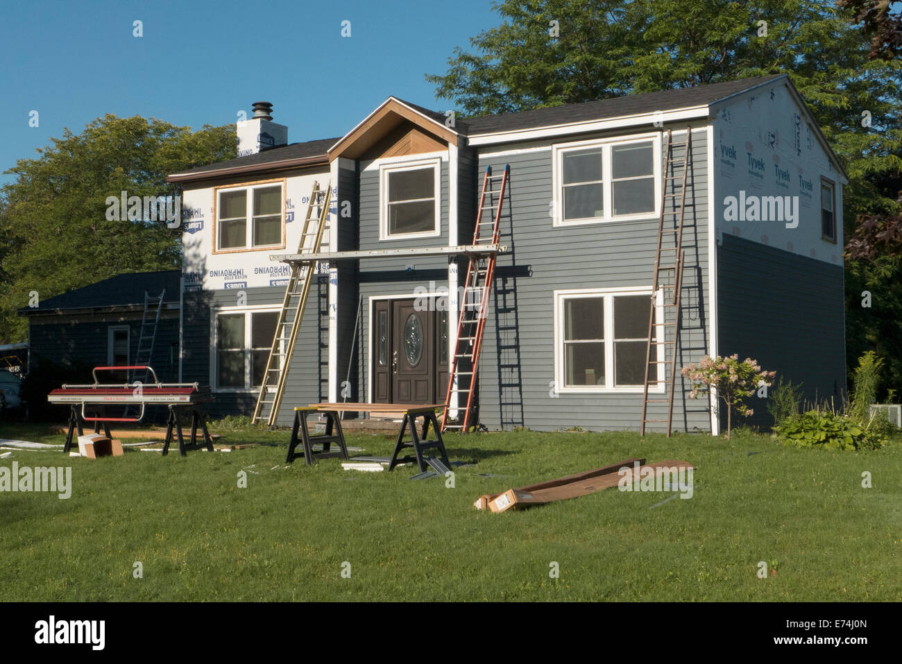 Private home being sided Stock Photo - Alamy