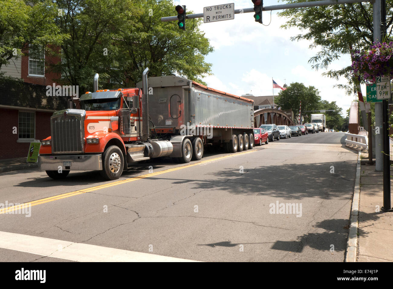 Giant trucks in traffic Stock Photo - Alamy