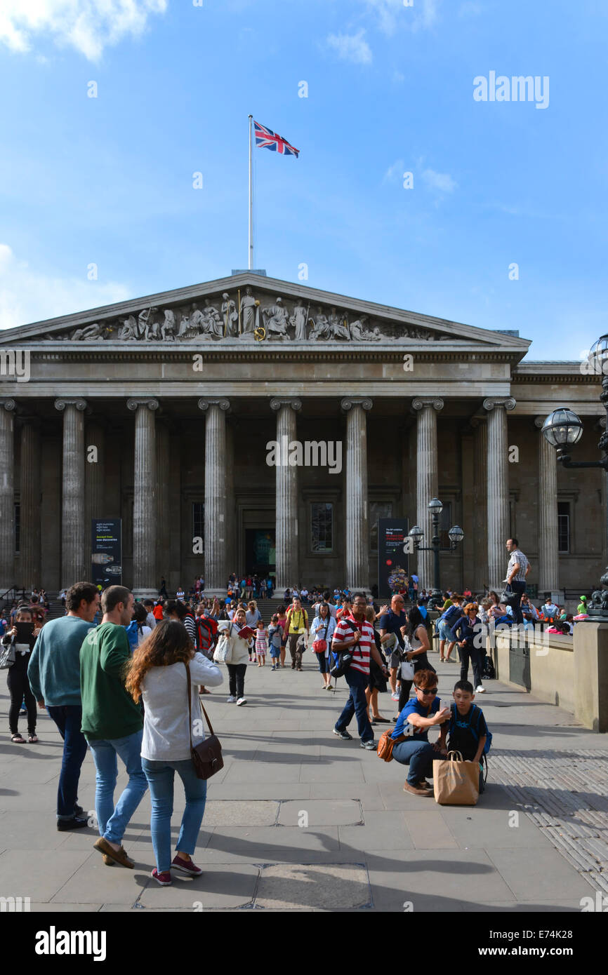 Visitors taking photographs at the entrance to the British Museum in ...