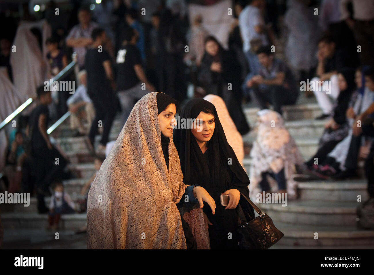 Tehran, Iran. 6th Sep, 2014. Iranian women pose for photos in front of ...