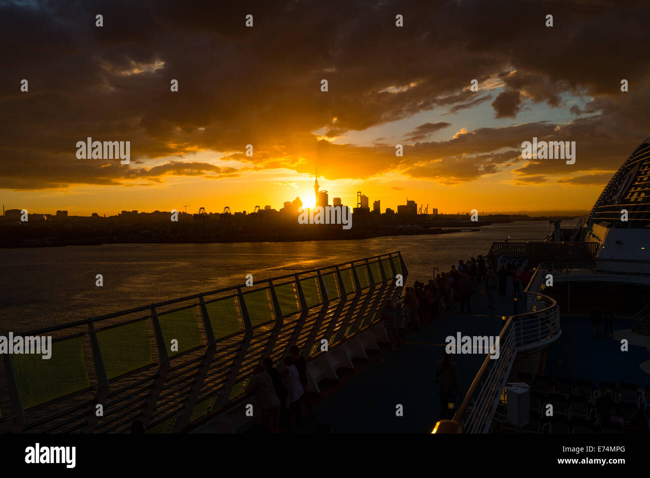 Spectacular Sunset over Auckland New Zealand as cruise ship leaves port ...