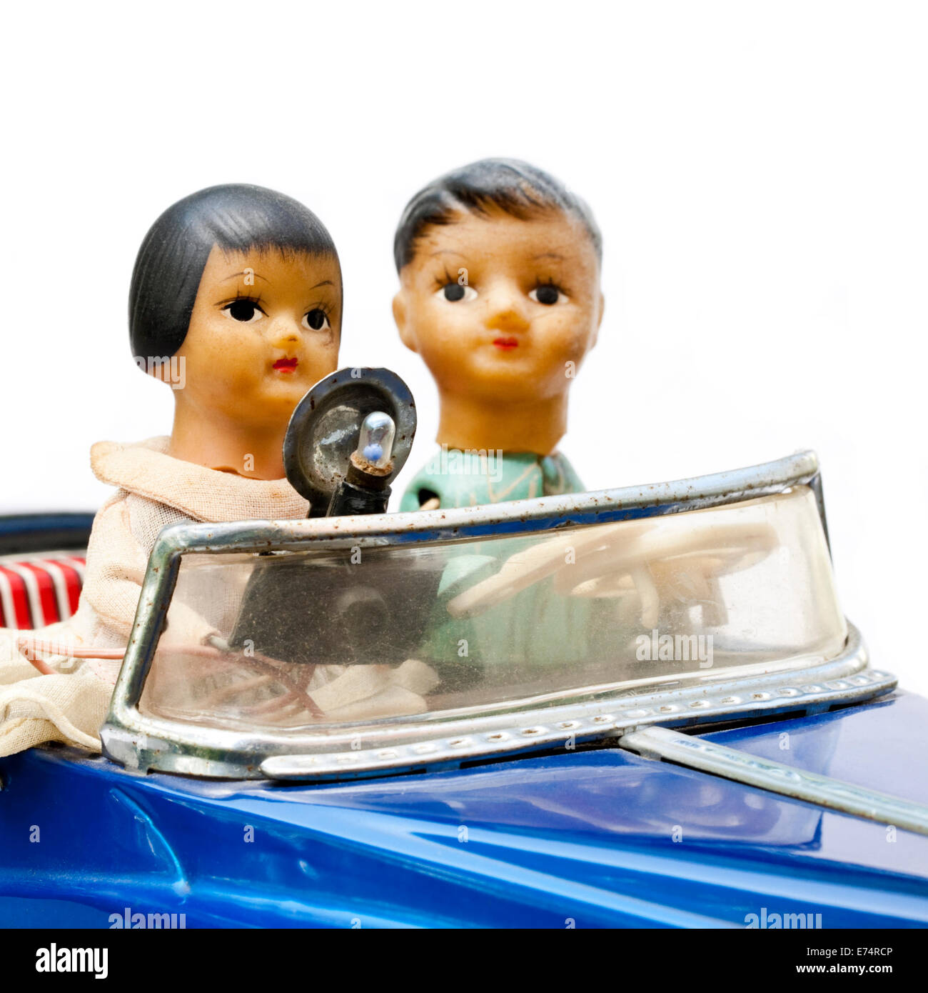 Vintage tinplate open-top model toy car with driver and passenger Stock ...