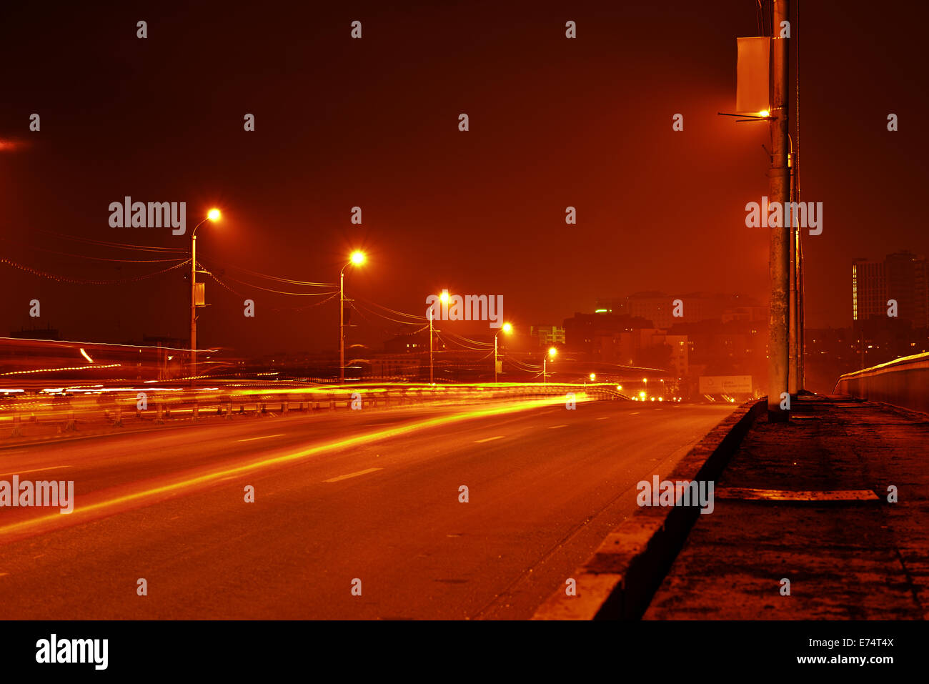 Night view of road in city Stock Photo - Alamy