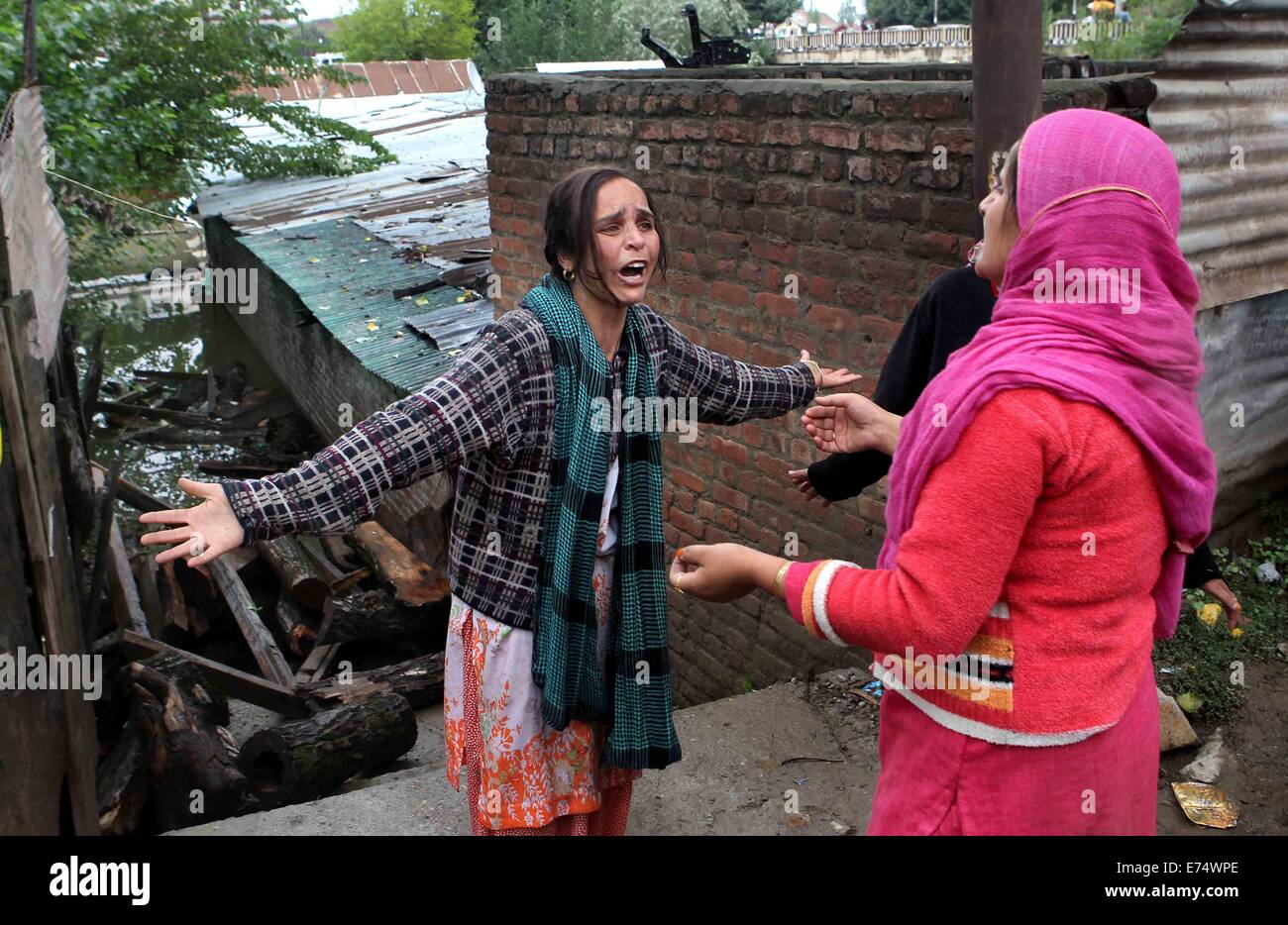 Srinagar, Indian-controlled Kashmir. 7th Sep, 2014. A Kashmir woman ...