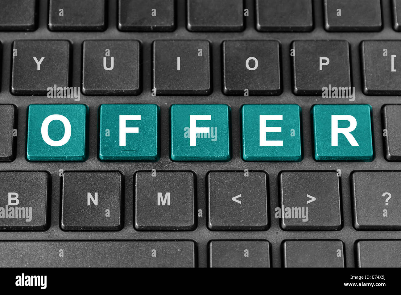 offer turquoise word on keyboard, business concept Stock Photo - Alamy