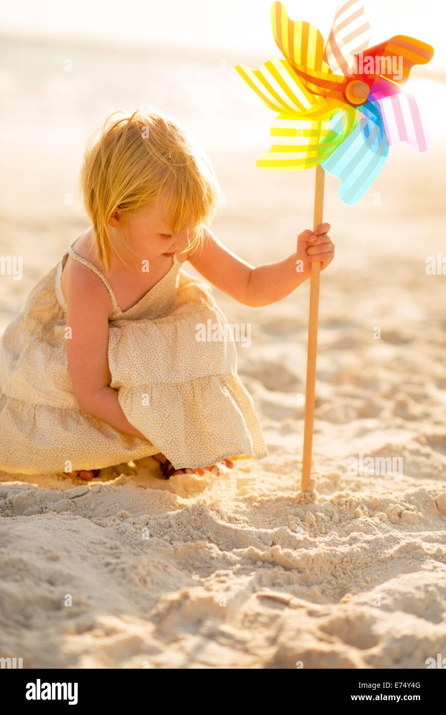 Child kid play windmill hi-res stock photography and images - Alamy