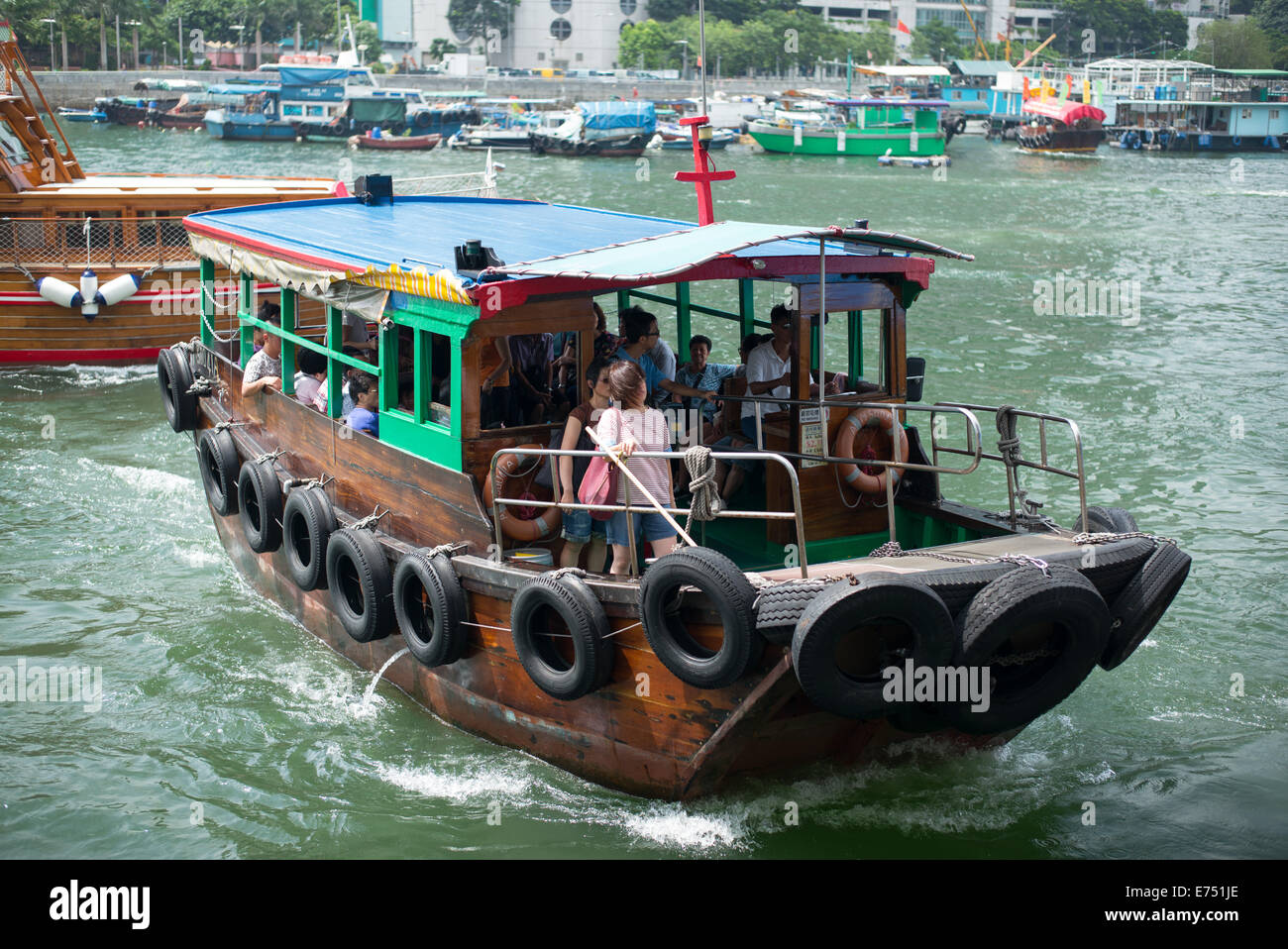 Junk boat ferries people across the Aberdeen harbour Stock Photo - Alamy