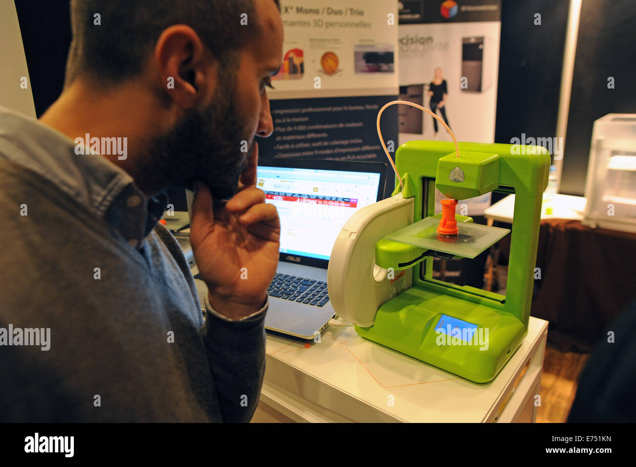 3D printers on display during the Paris 3D printshow, an event ...
