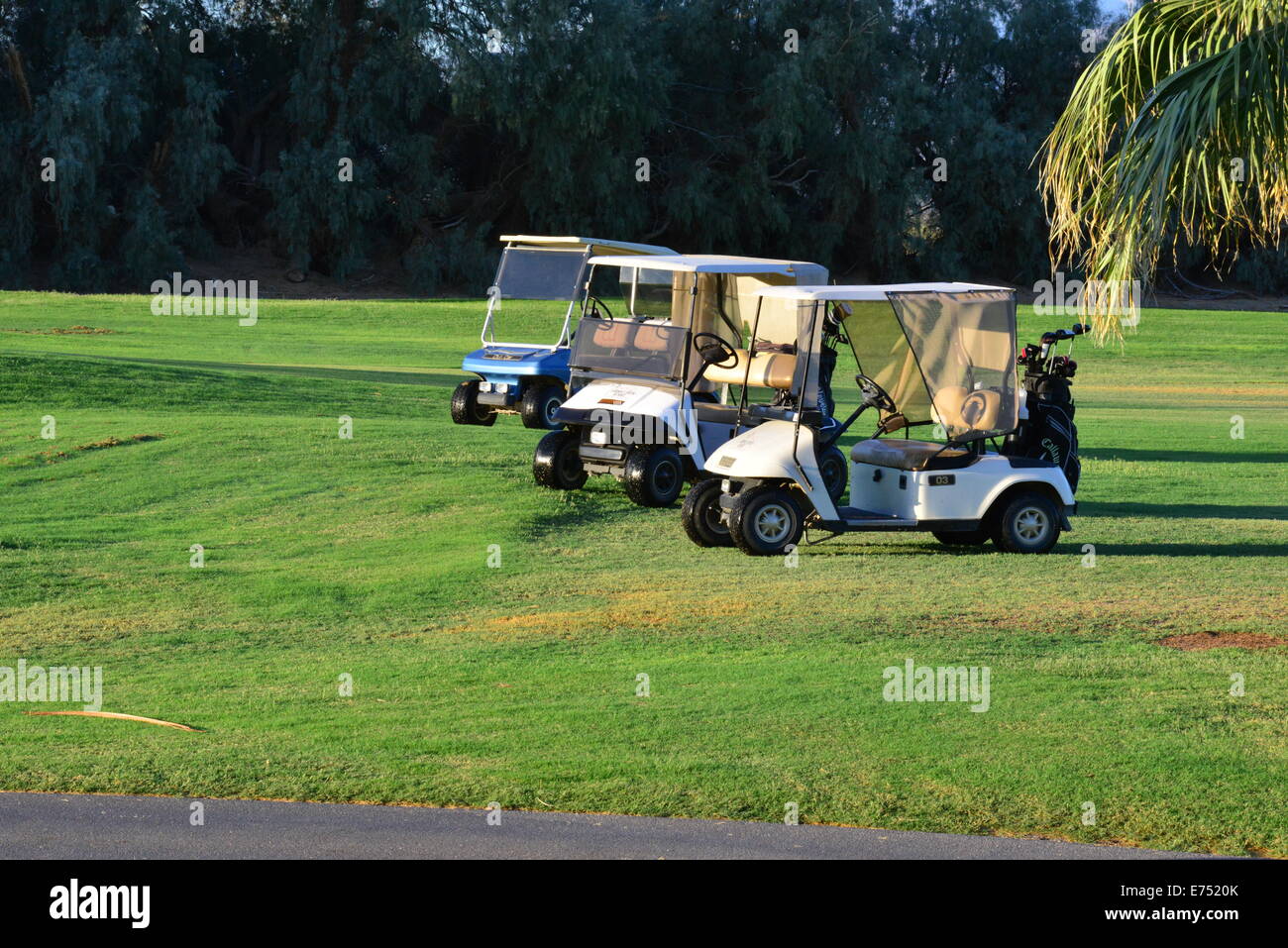 Golf carts on a golf course at Furnace Creek, California Stock Photo ...