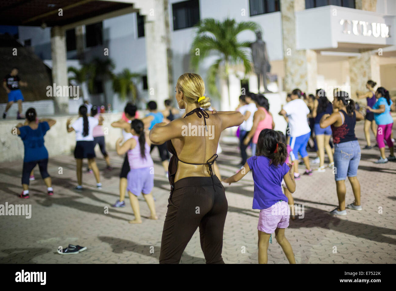 Outdoor zumba class in Mexico square with sweaty woman Stock Photo - Alamy