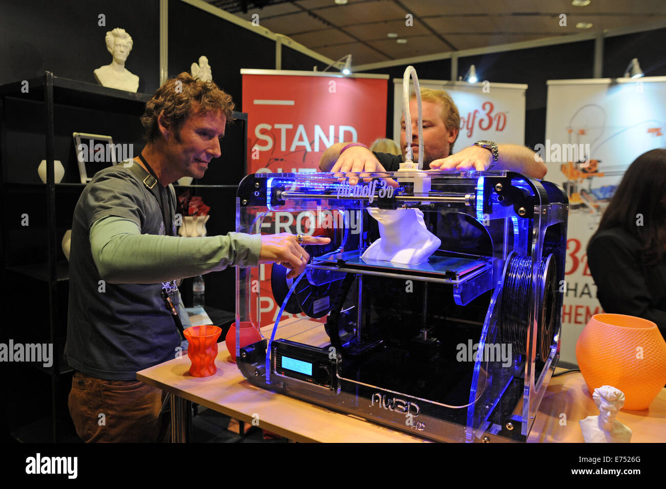 3D printers on display during the Paris 3D printshow, an event ...
