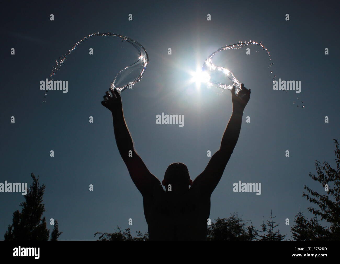 Throwing water hi-res stock photography and images - Alamy
