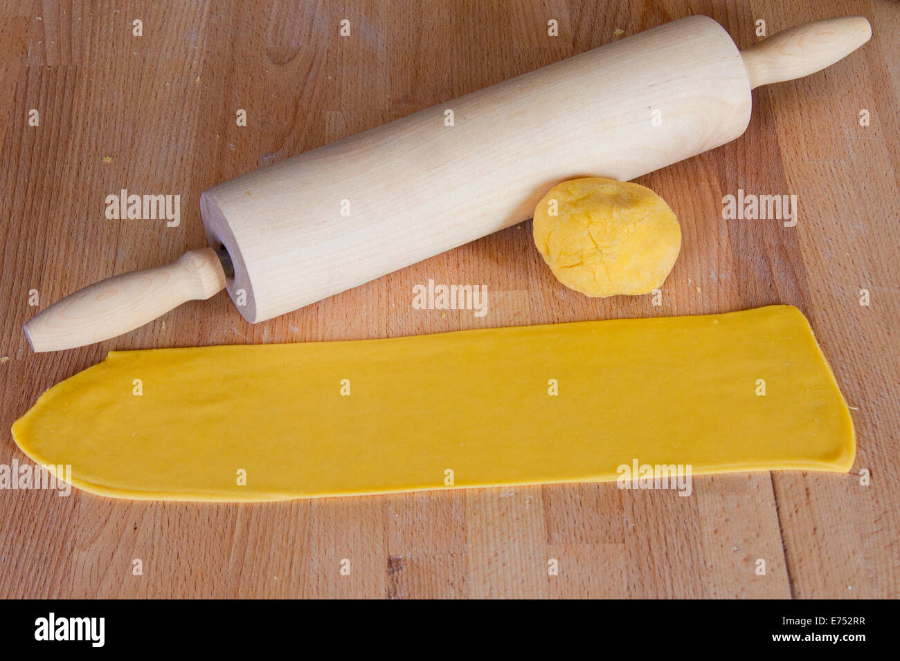 Rolling Pasta With A Rolling Pin High Resolution Stock Photography and ...