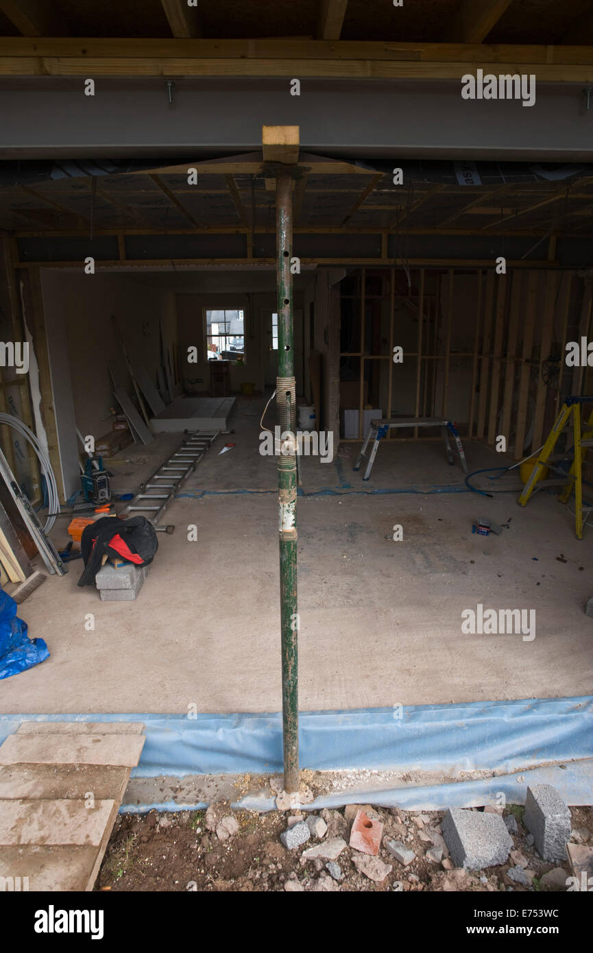 Acrow prop supporting steel beam for house extension Hay-on-Wye Powys ...