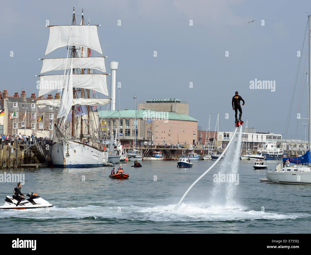 Flyboarding in Weymouth Harbour during Waterfest, Dorset, Britain, UK ...