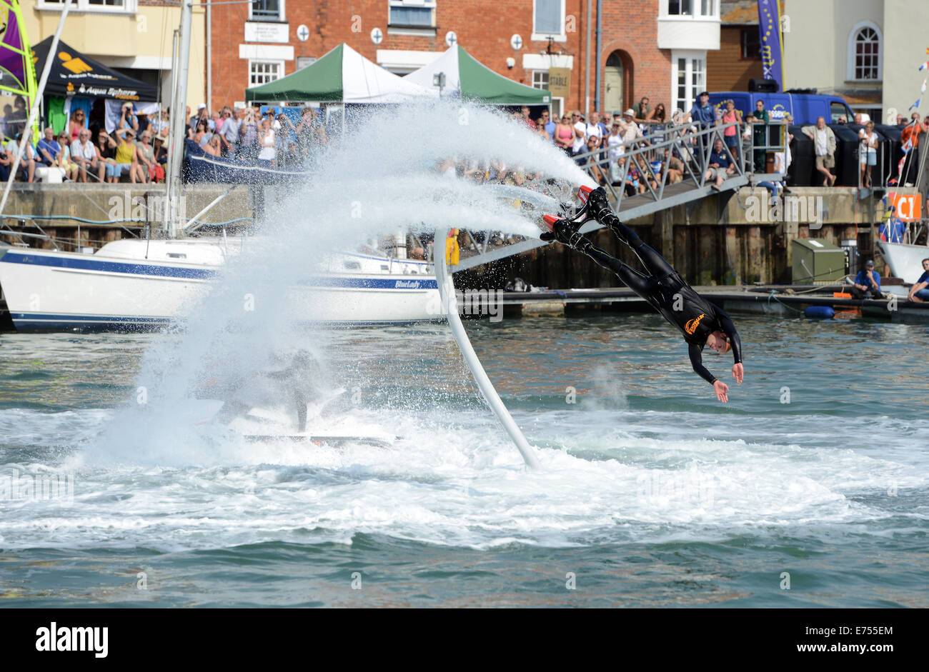 Flyboarding in Weymouth Harbour during Waterfest, Dorset, Britain, UK ...