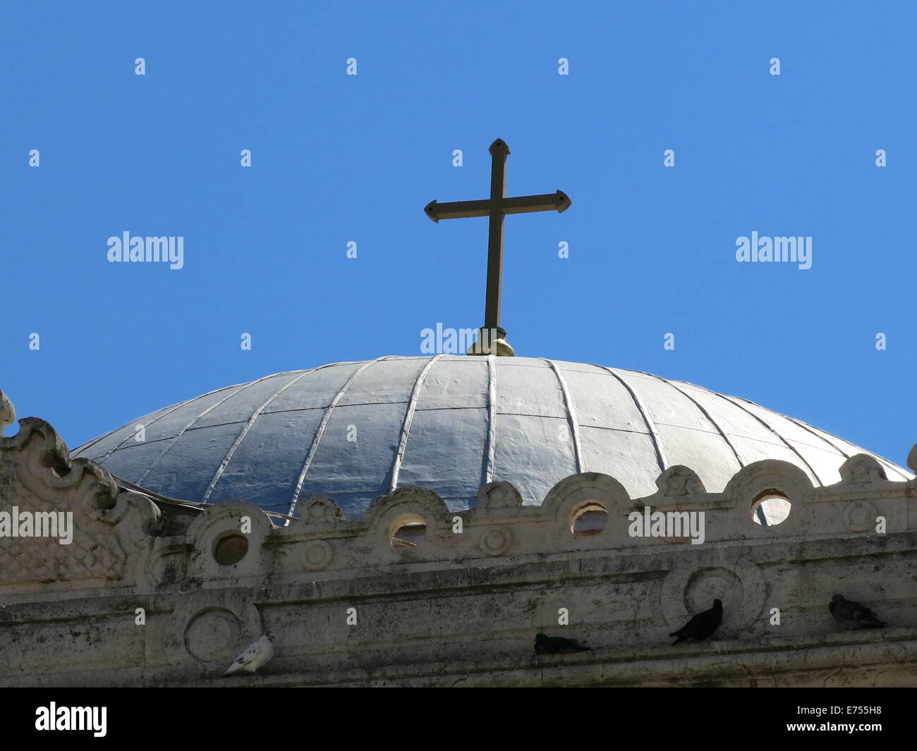 Dome and cross of an orthodox chuch against a blue sky. ( Concept ...
