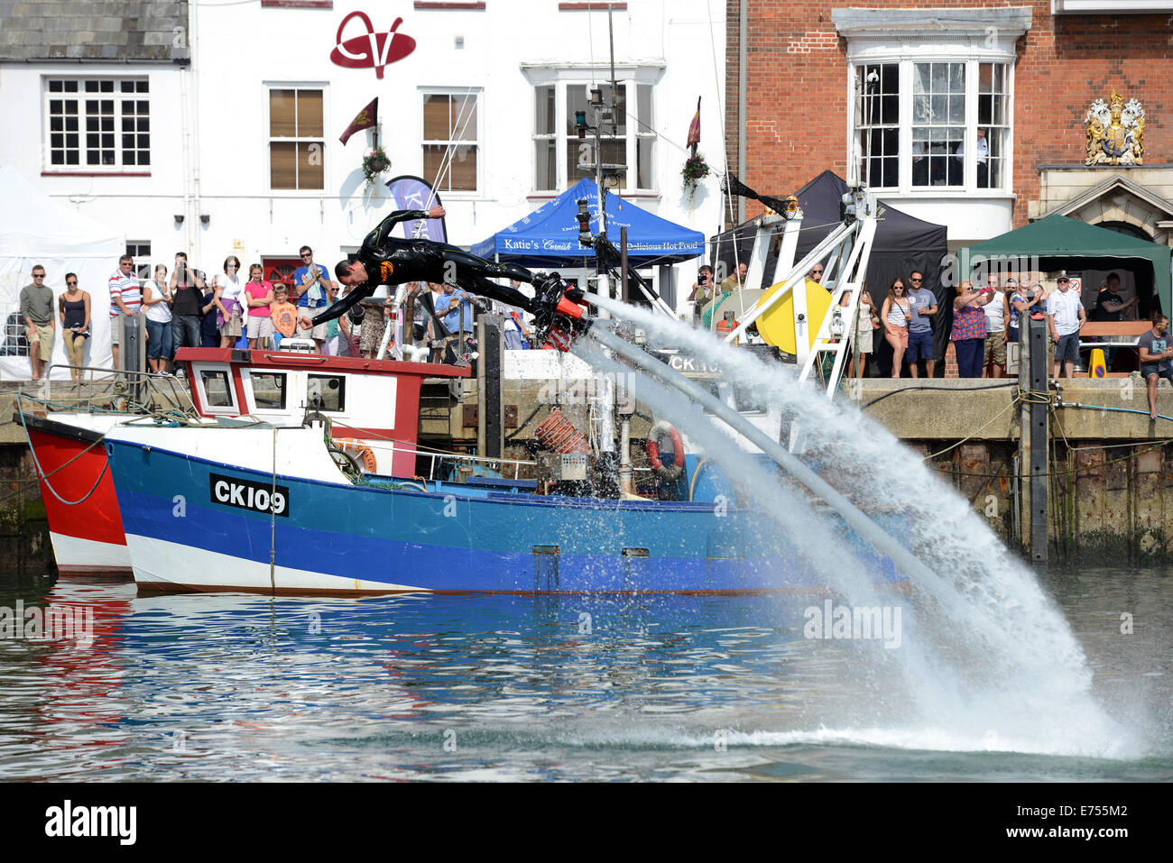 Flyboarding in Weymouth Harbour during Waterfest, Dorset, Britain, UK ...