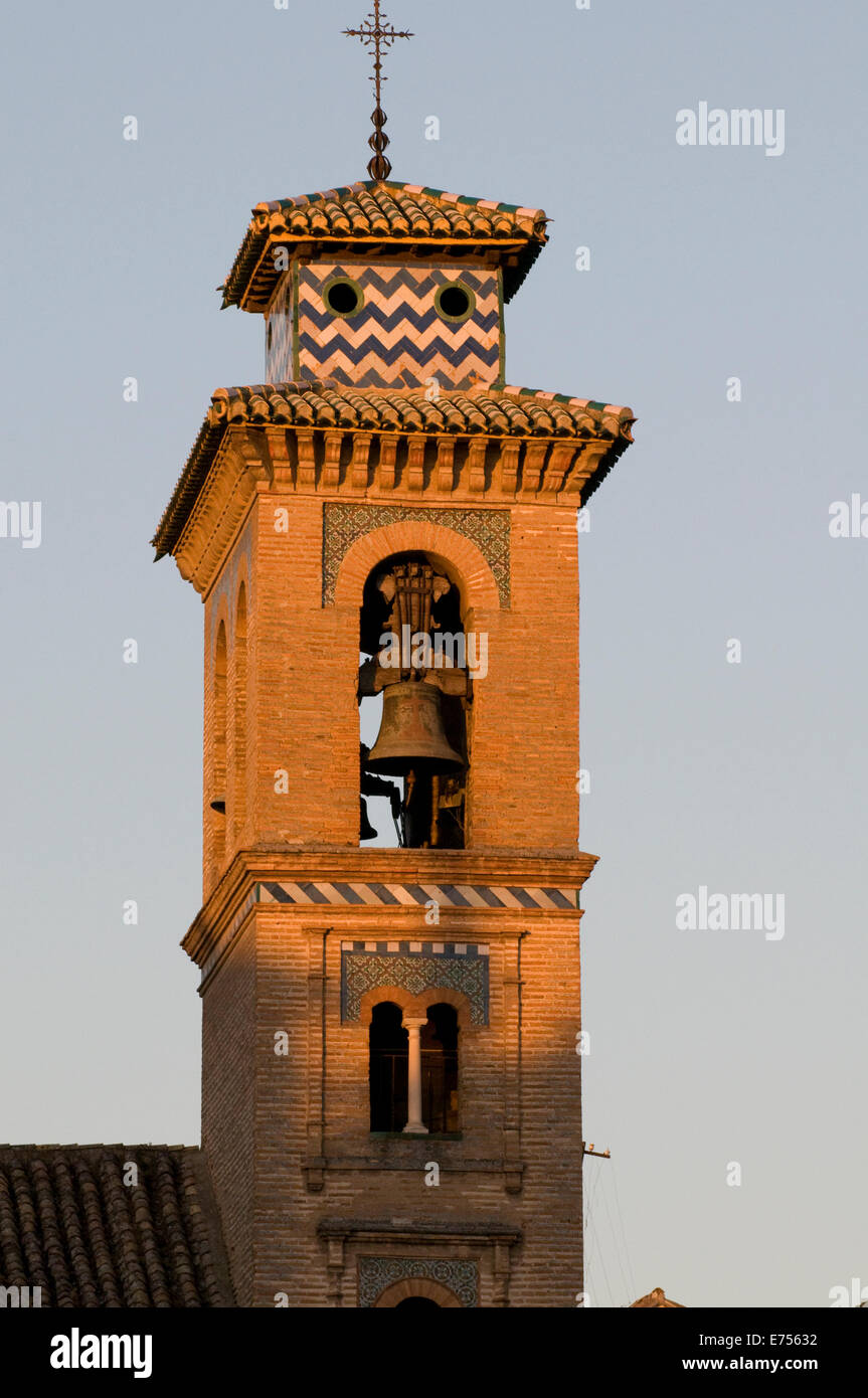Sunset sunlit Bell tower of San Gil y Santa Ana Church detail, Granada ...