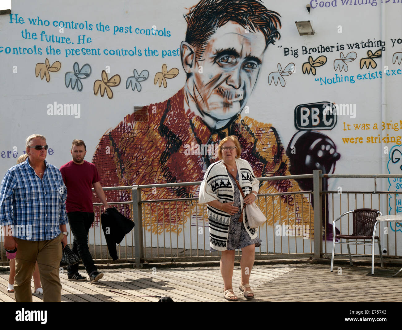 A mural featuring George Orwell close to the pier in Southwold Stock Photo - Alamy