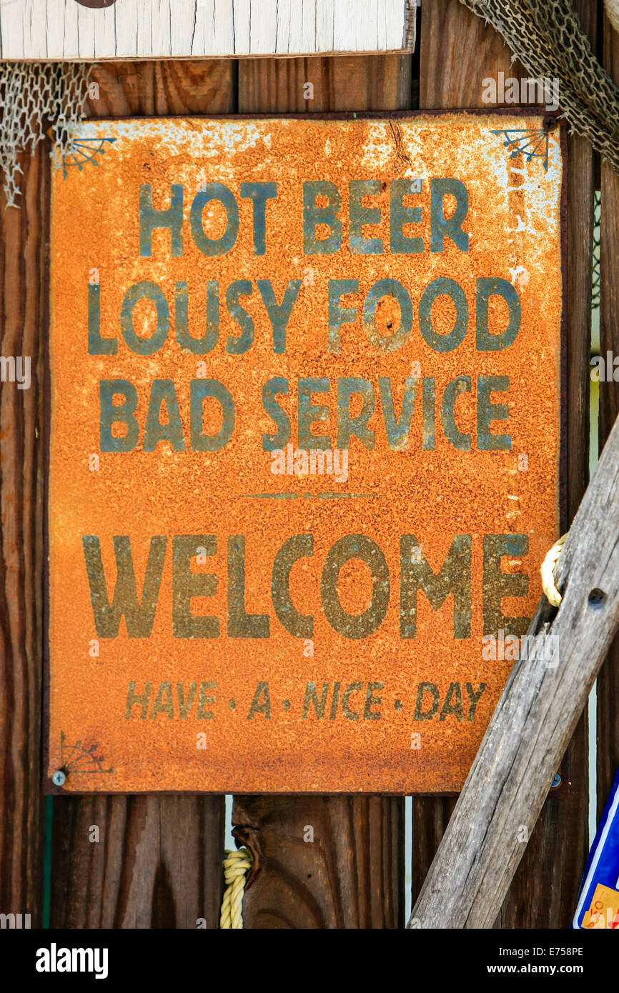 Old rusty sign outside a restaurant in Florida Stock Photo - Alamy