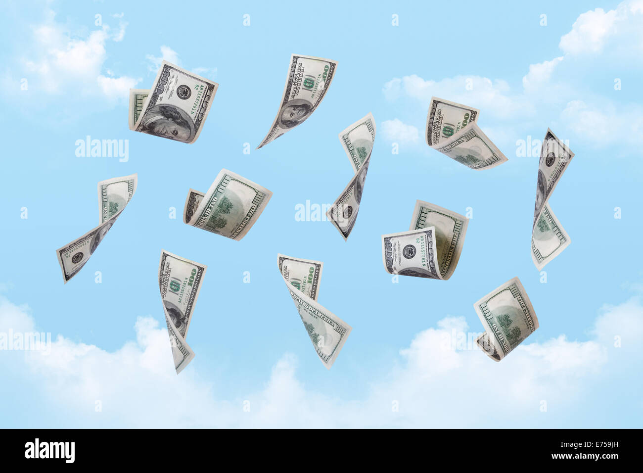 Dollar banknotes falling down on cloudy sky background Stock Photo - Alamy