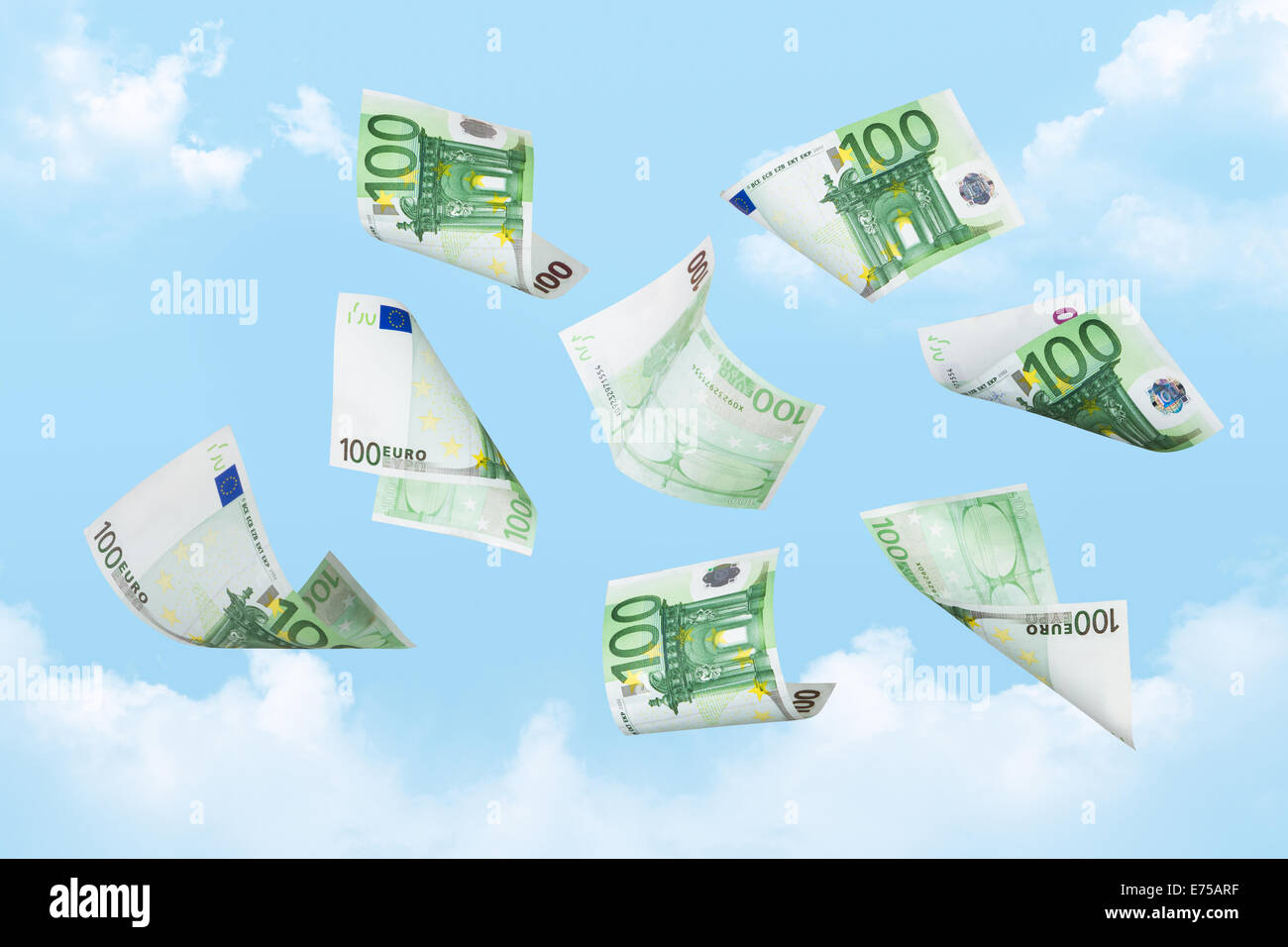 Euro banknotes falling down on cloudy sky background Stock Photo - Alamy