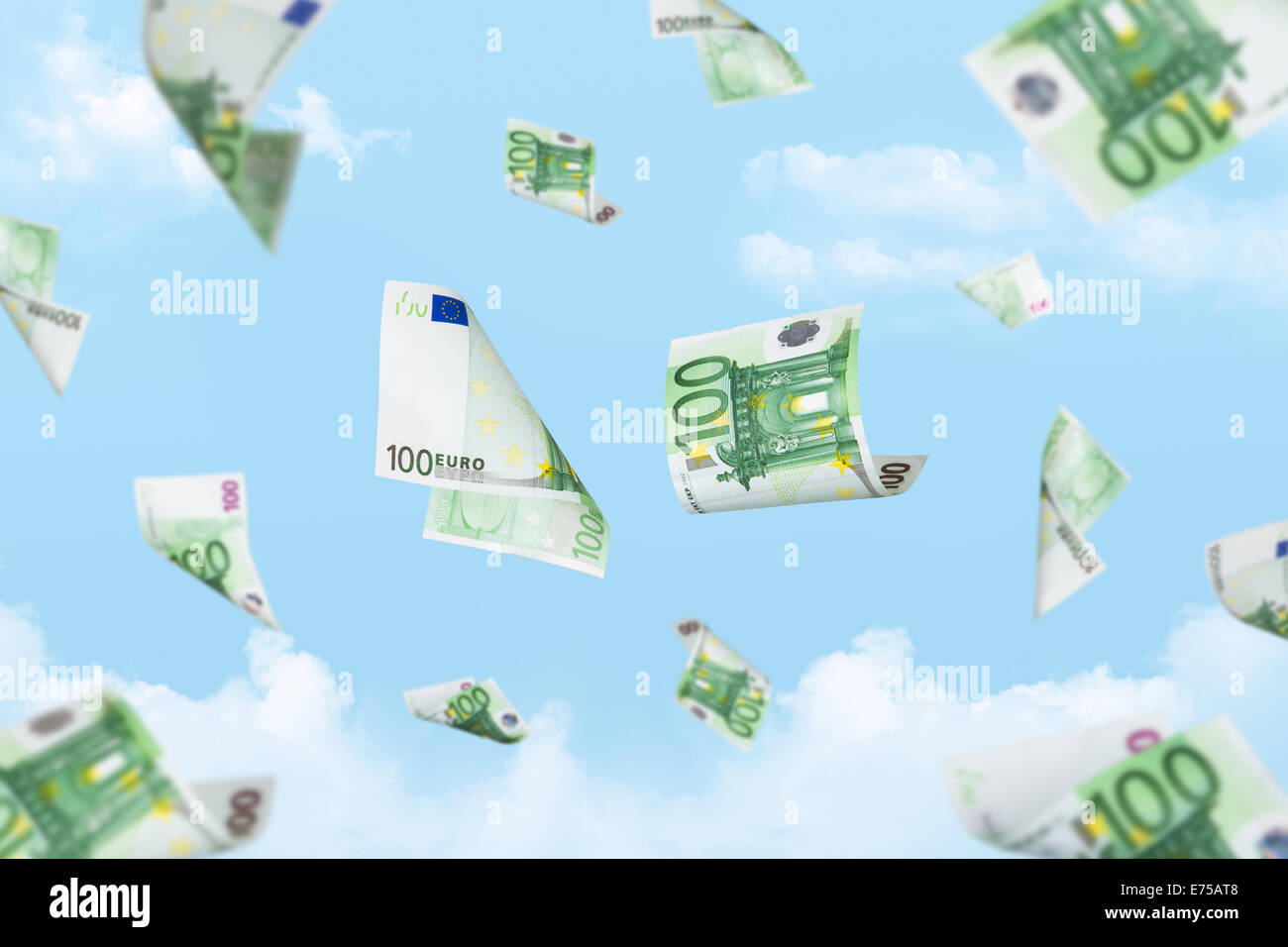 Euro banknotes falling down on cloudy sky background Stock Photo - Alamy