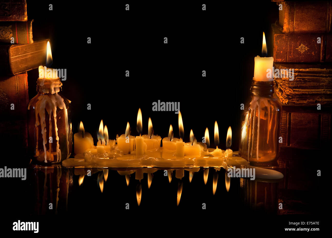 Old books candles hi-res stock photography and images - Alamy